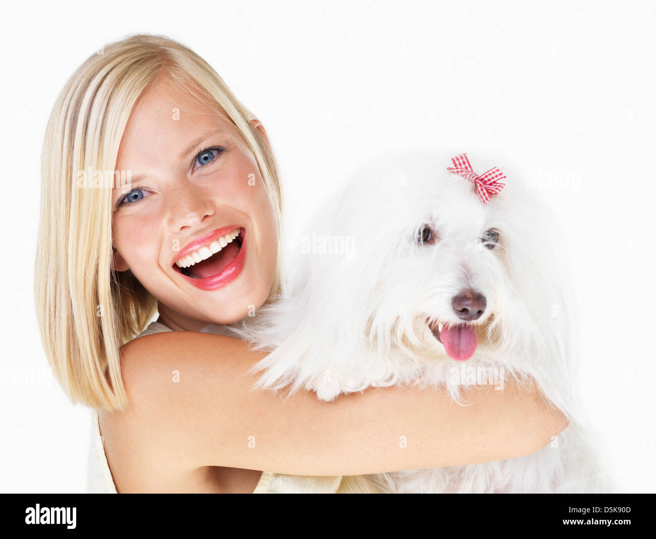 Woman holding dog hi-res stock photography and images - Alamy