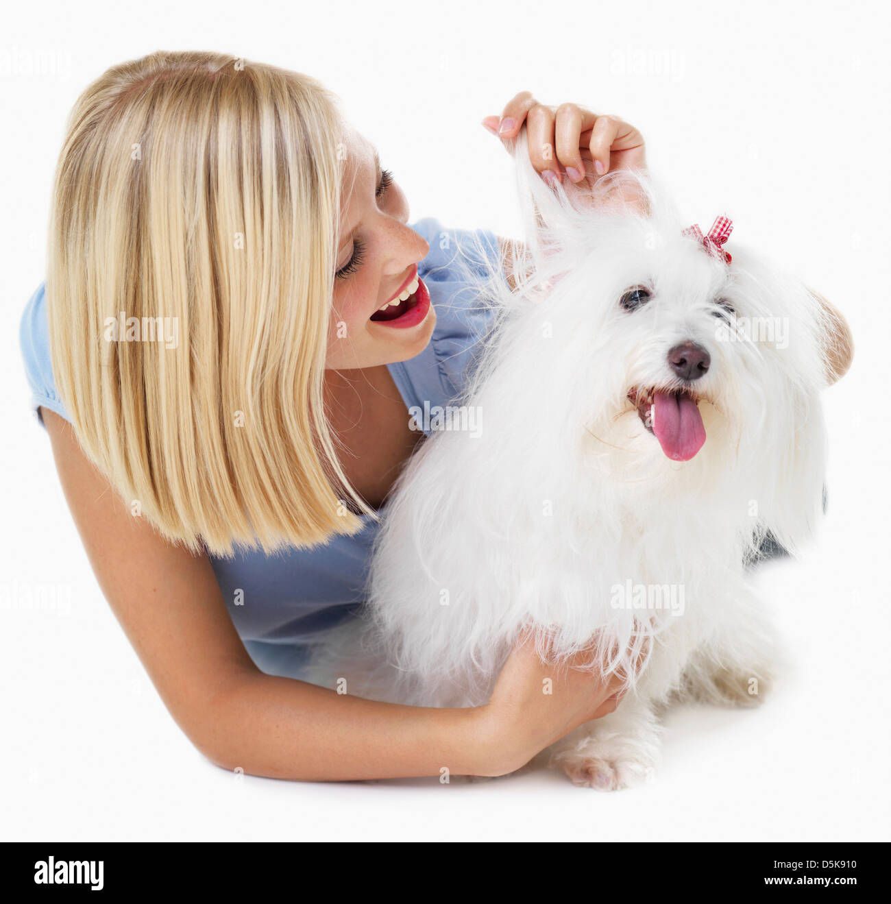 Pet owner woman stroking Cut Out Stock Images & Pictures - Alamy