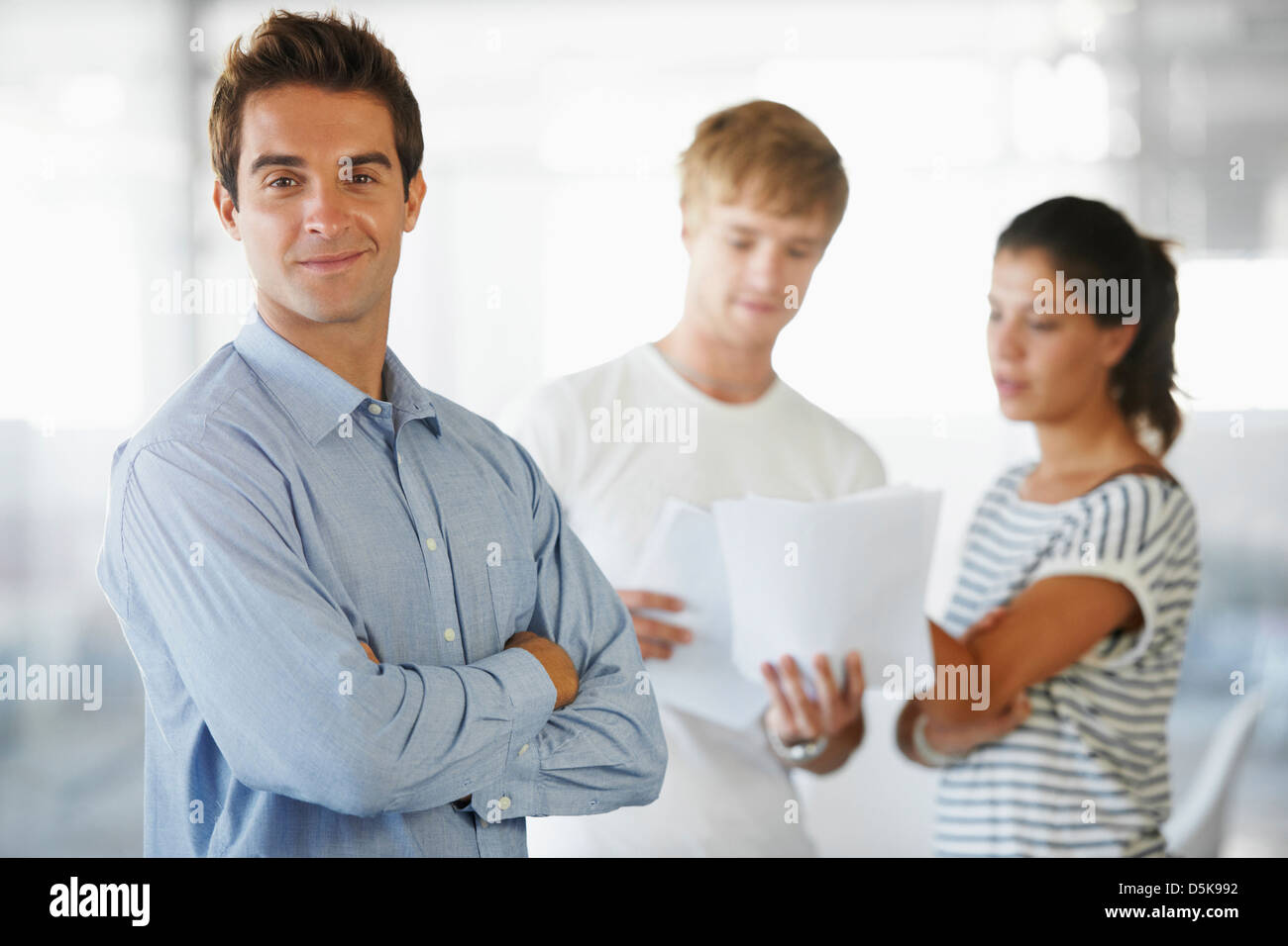 Portrait of coworkers in office Stock Photo - Alamy