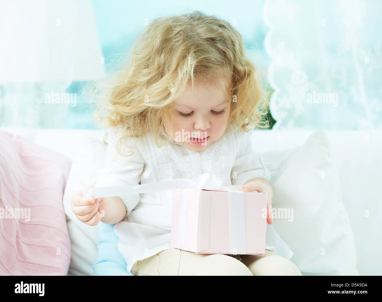 Beauty present unwrapping hi-res stock photography and images - Alamy