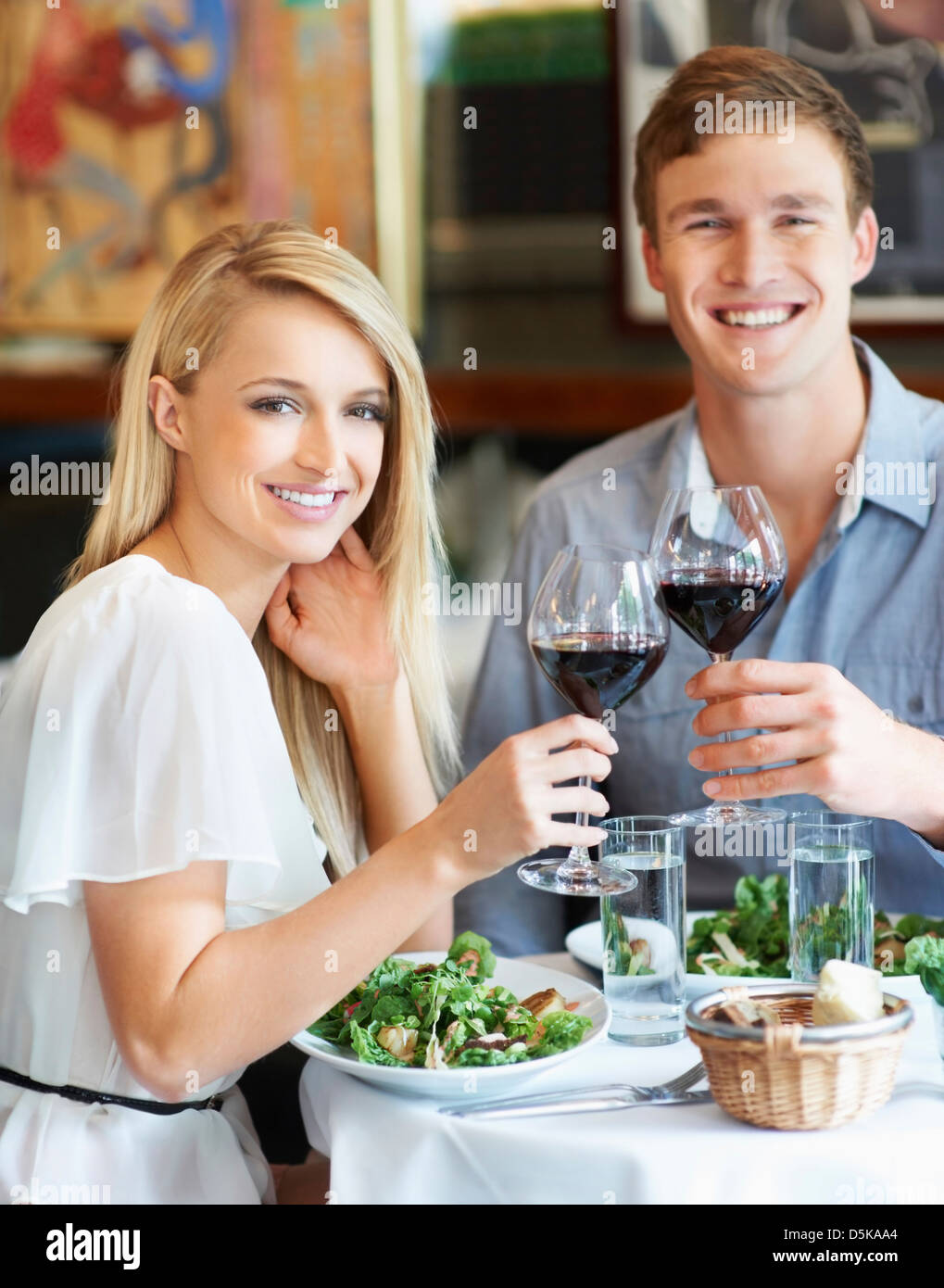 Romantic couple eating lunch table hi-res stock photography and images ...