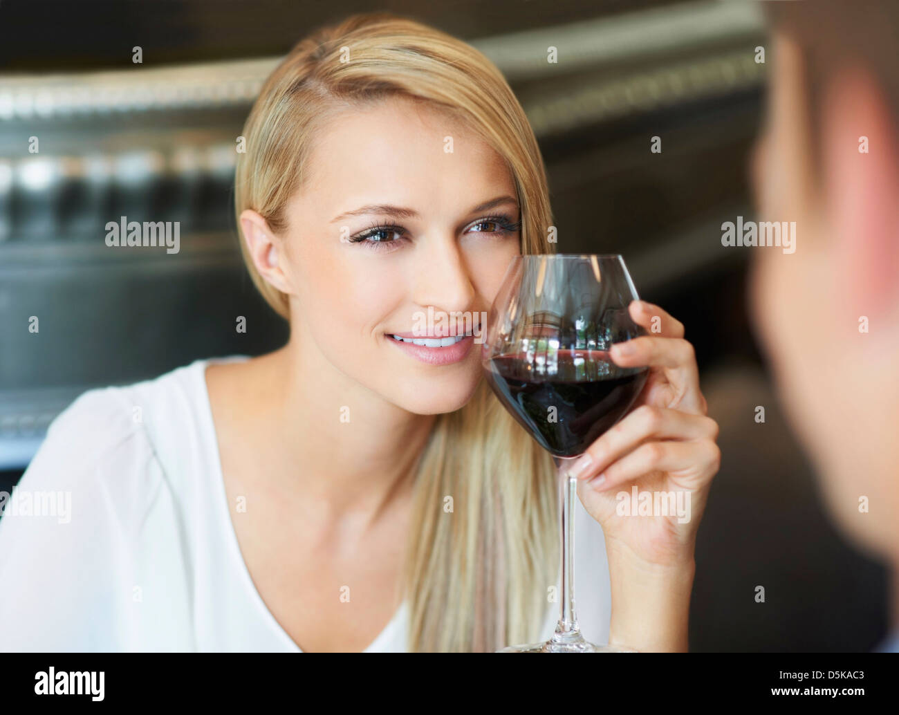 Woman drinking wine Stock Photo - Alamy