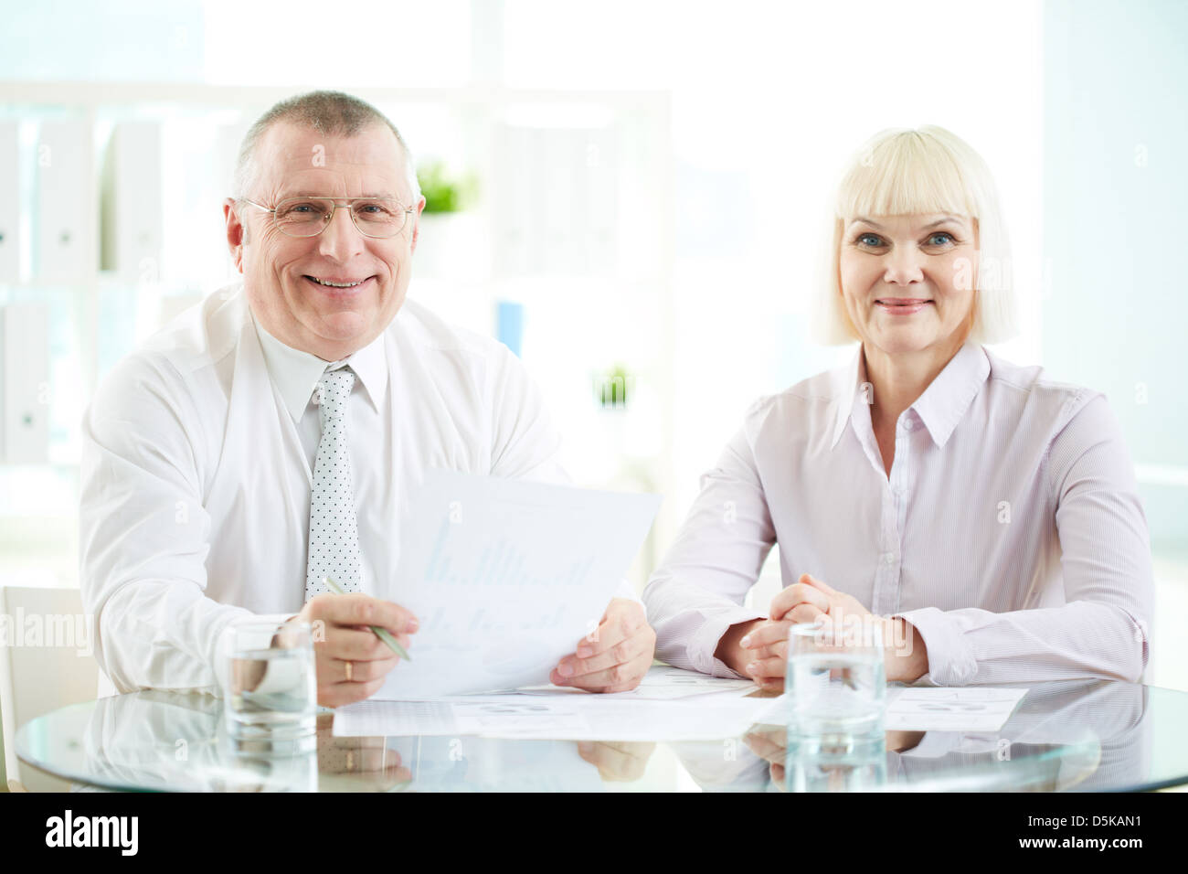 Two cheerful senior business partners hi-res stock photography and ...