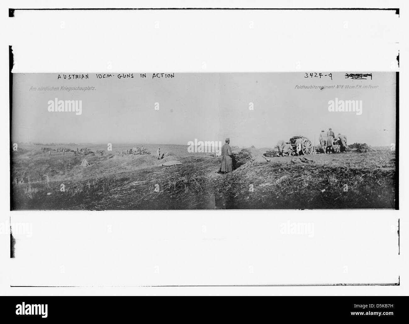 A photograph showing Austrian artillery, specifically 10cm guns, in ...