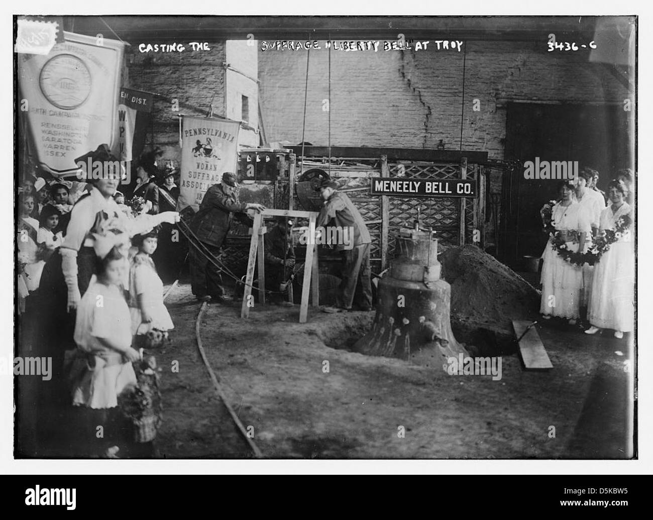 This photograph shows the casting of the Suffrage Liberty Bell at the ...