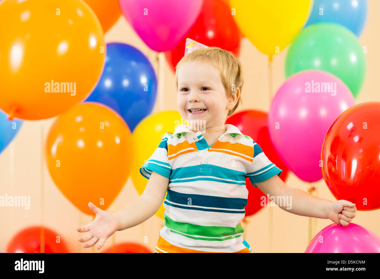 joyful kid boy on birthday party Stock Photo - Alamy
