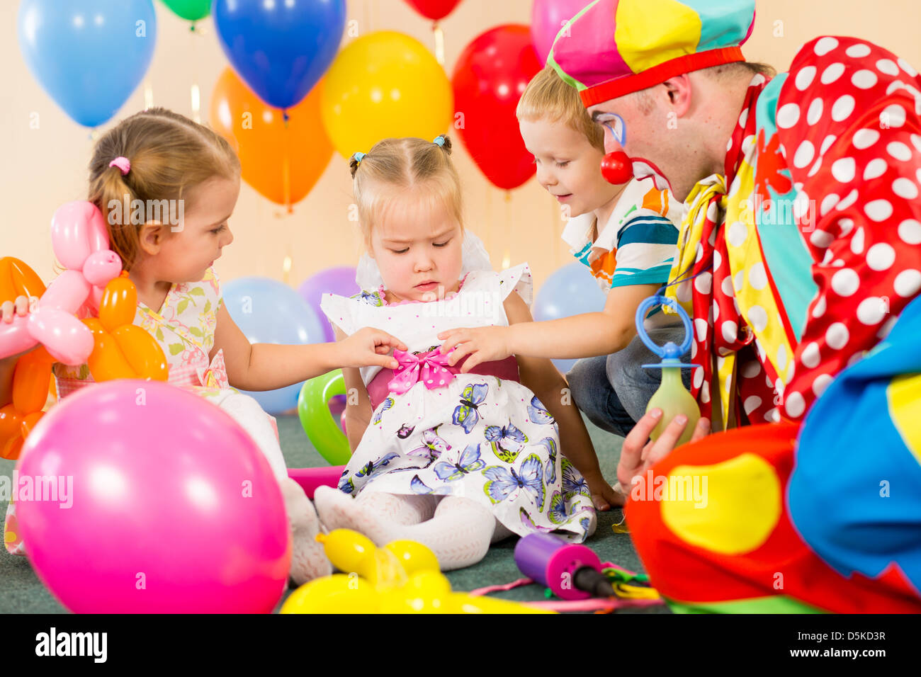 children and clown on birthday party Stock Photo - Alamy