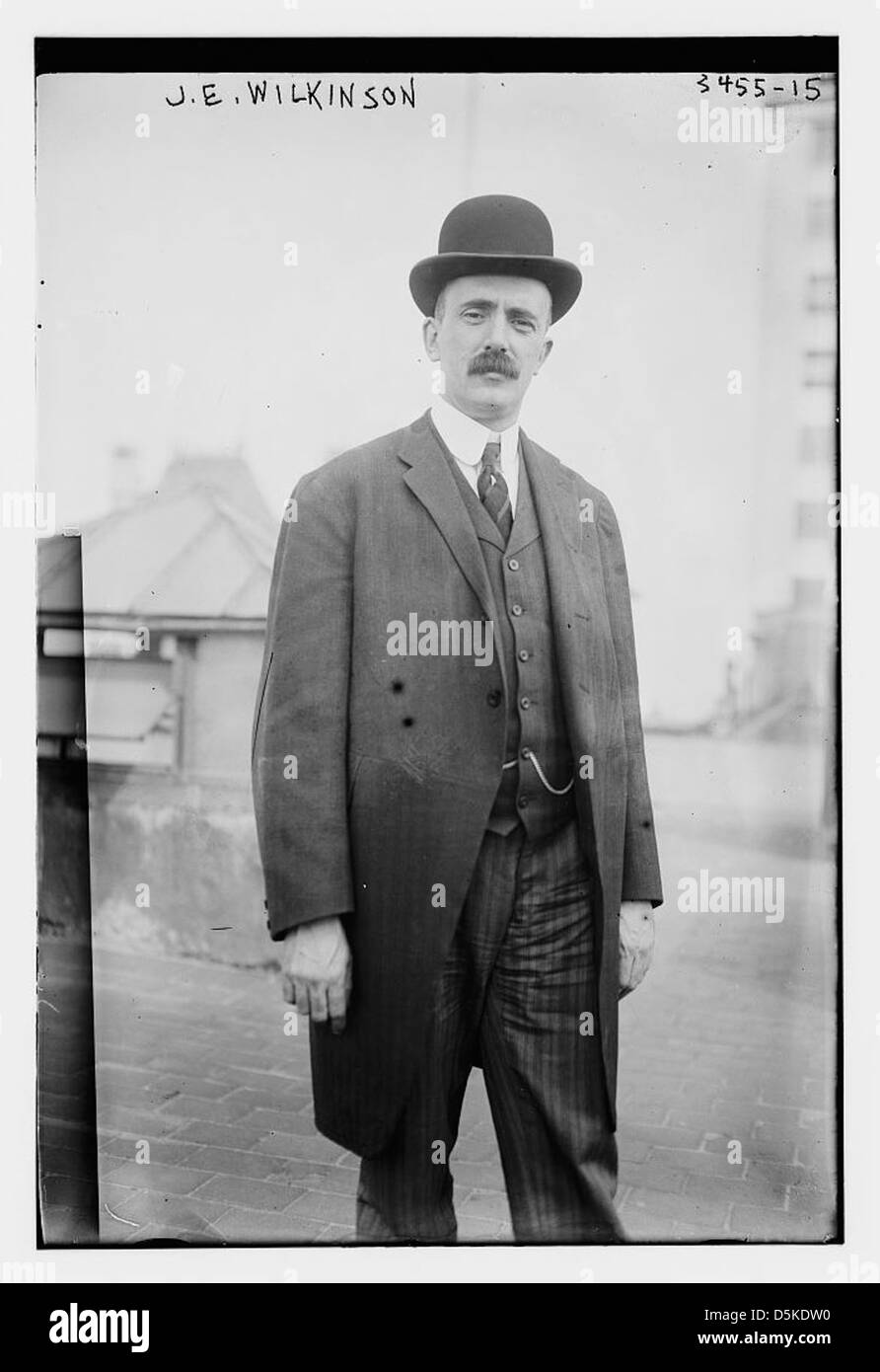 This portrait features J.E. Wilkinson, captured in a photograph from ...