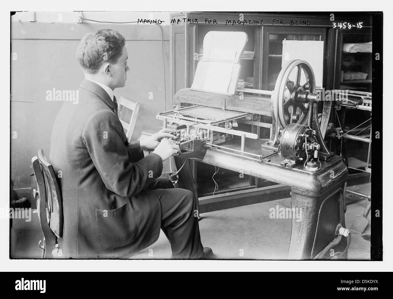 This photograph shows a machine used to create a matrix for printing ...