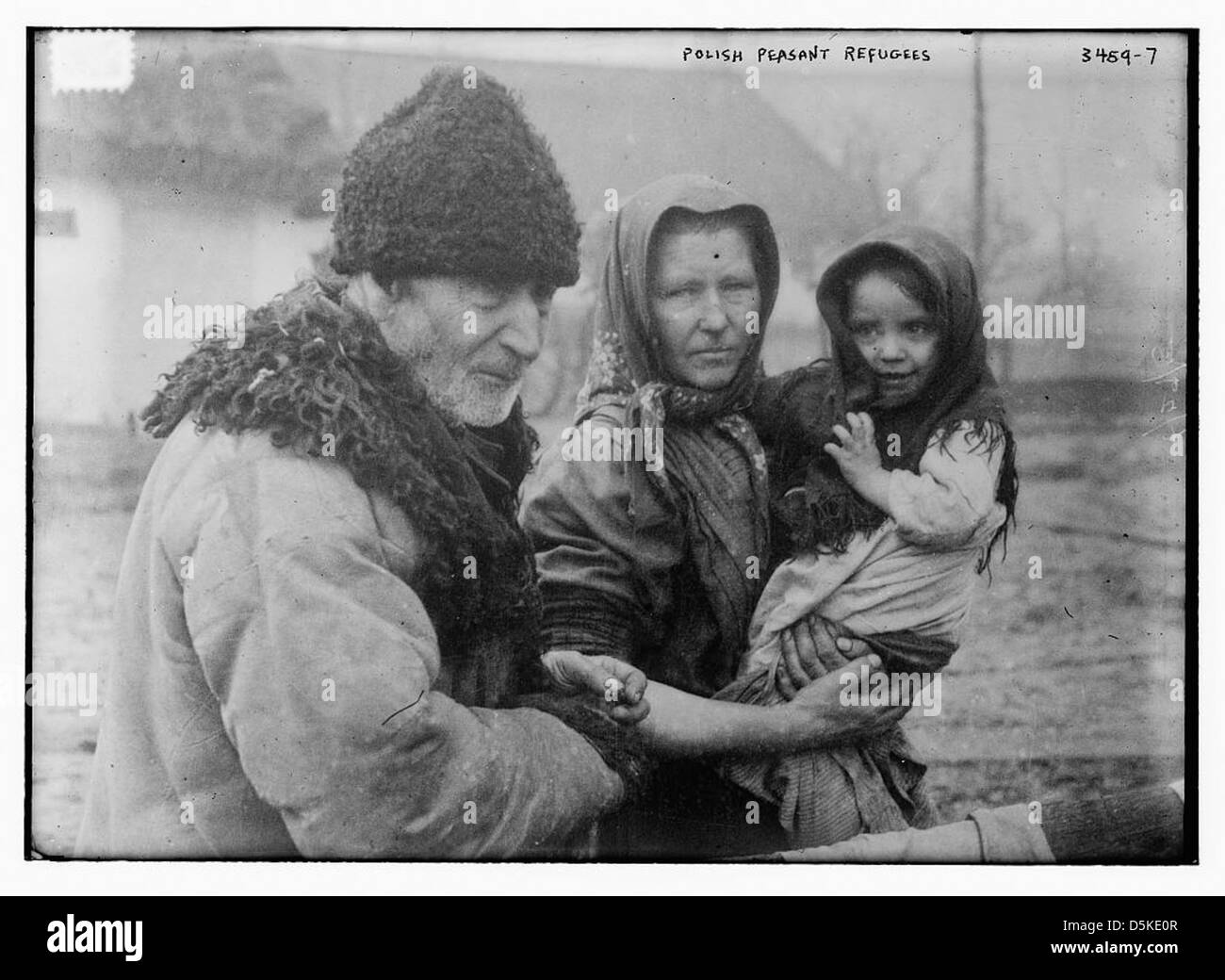 A photograph of Polish peasant refugees, showing a woman with a child ...