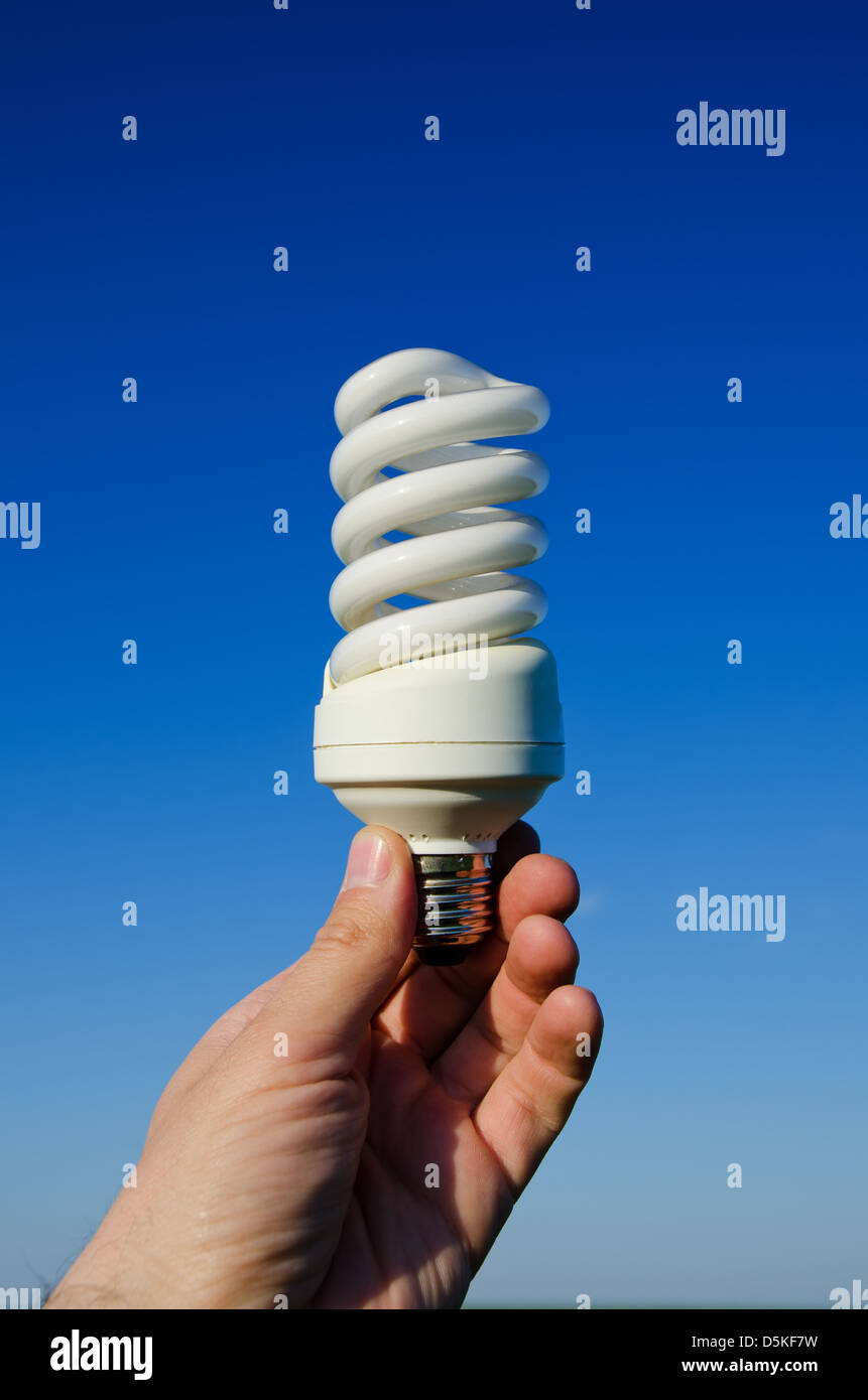 light bulb in hand Stock Photo - Alamy
