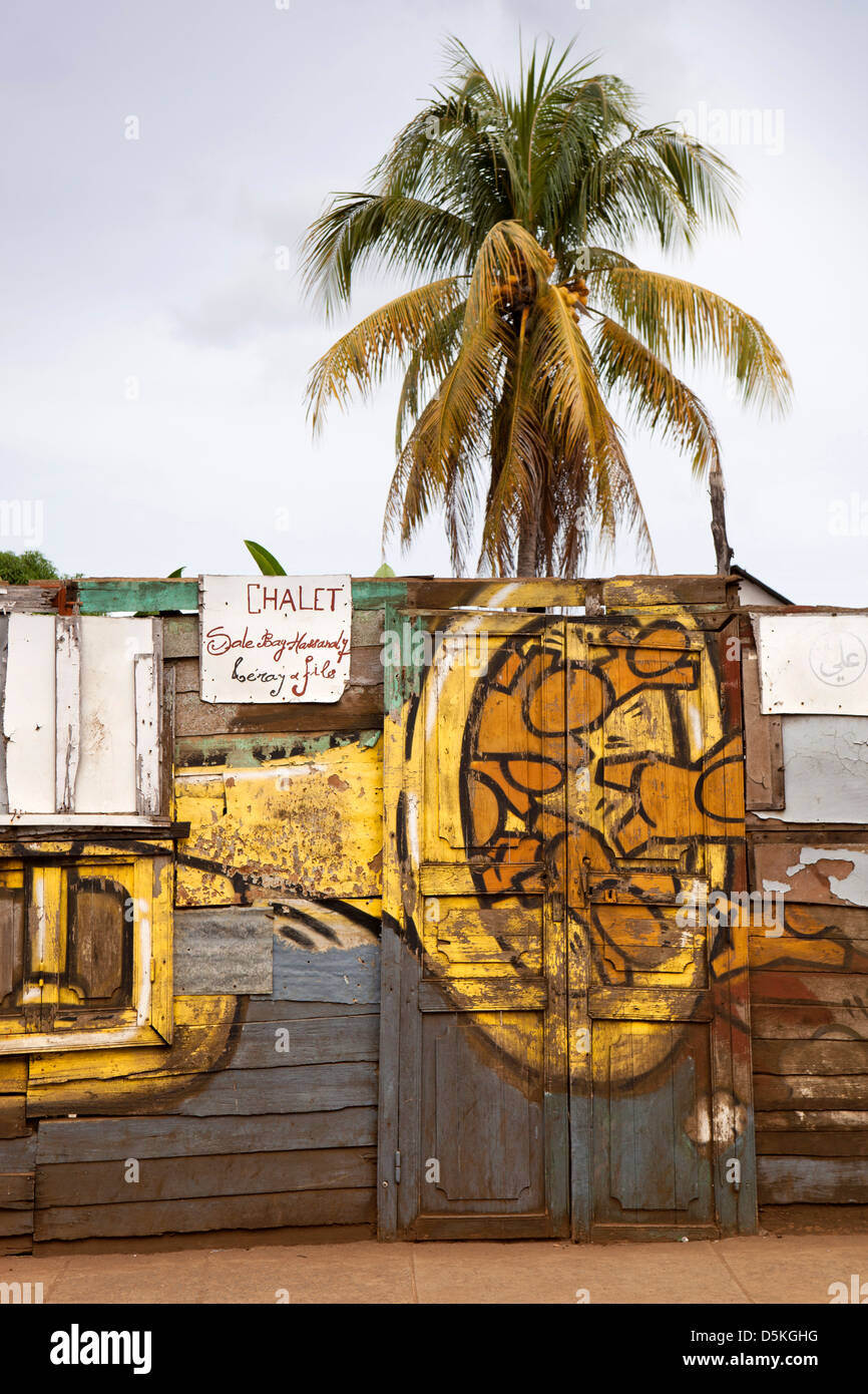 Madagascar, Nosy Be, Hell-Ville, attractively painted fence of empty ...