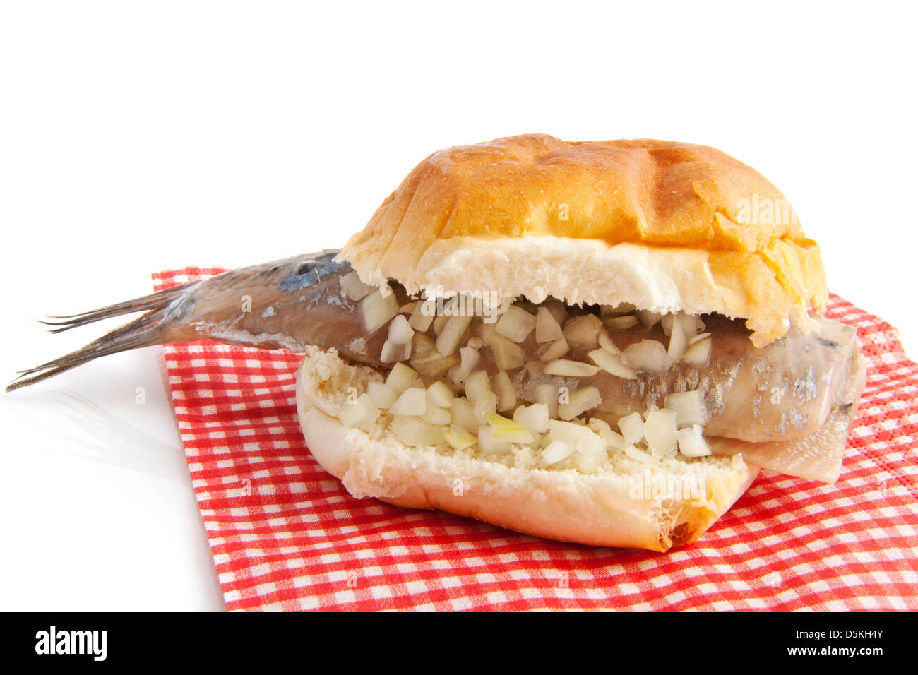 Fresh dutch delicious raw fish on a napkin over white Stock Photo - Alamy