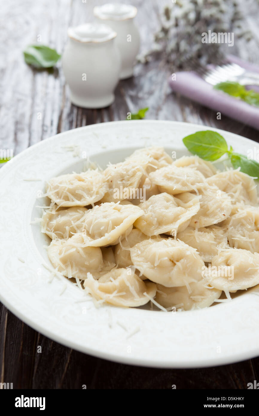 delicious ravioli with basil and parmesan, closeup Stock Photo - Alamy
