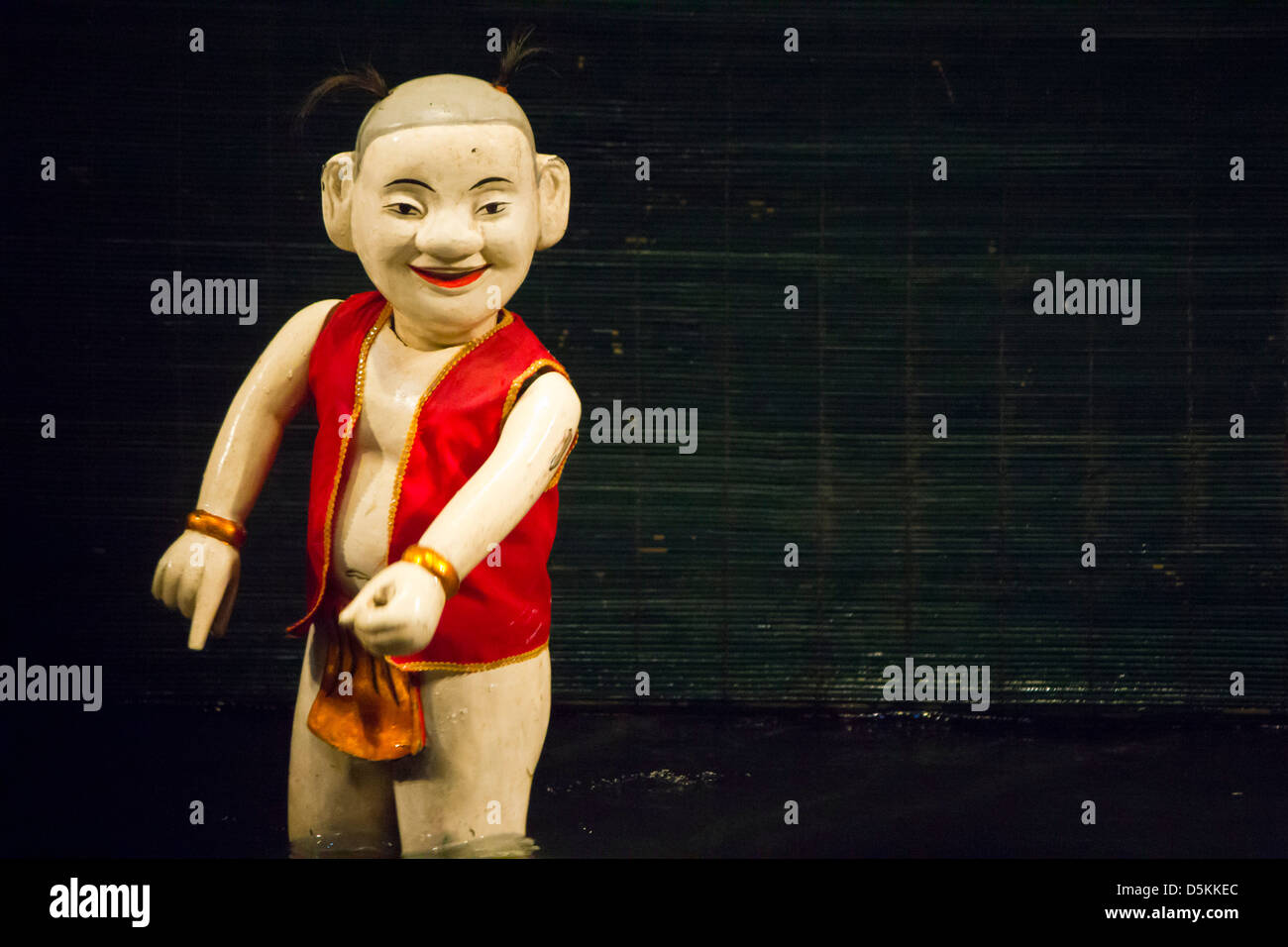 A small puppet figure in a puppet show Stock Photo - Alamy