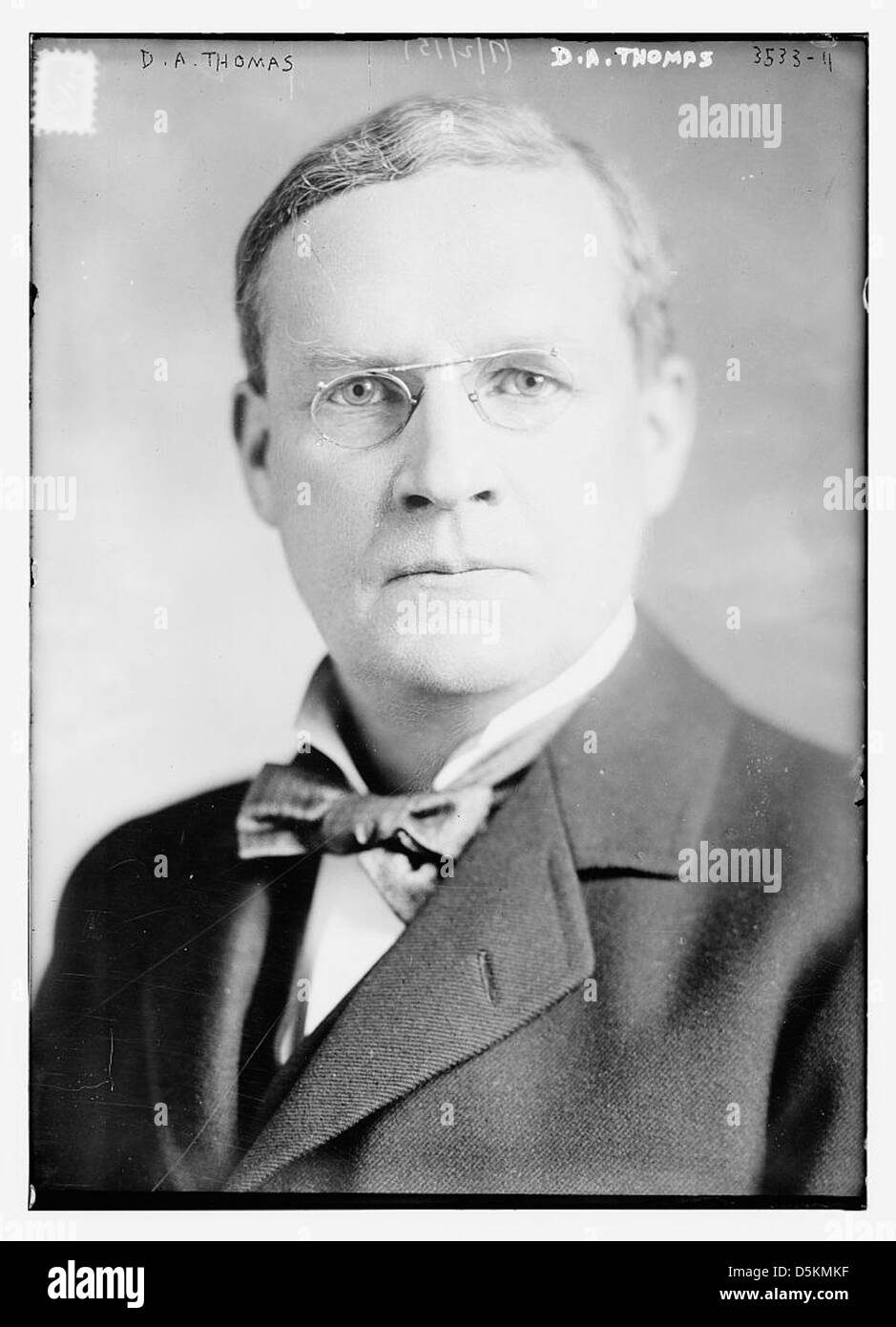 A formal photograph of D.A. Thomas, capturing a historical figure in a ...