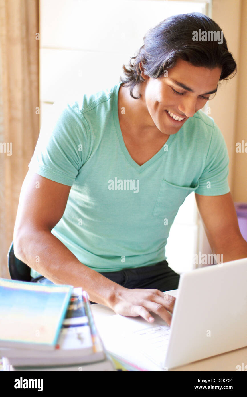Man using laptop Stock Photo - Alamy