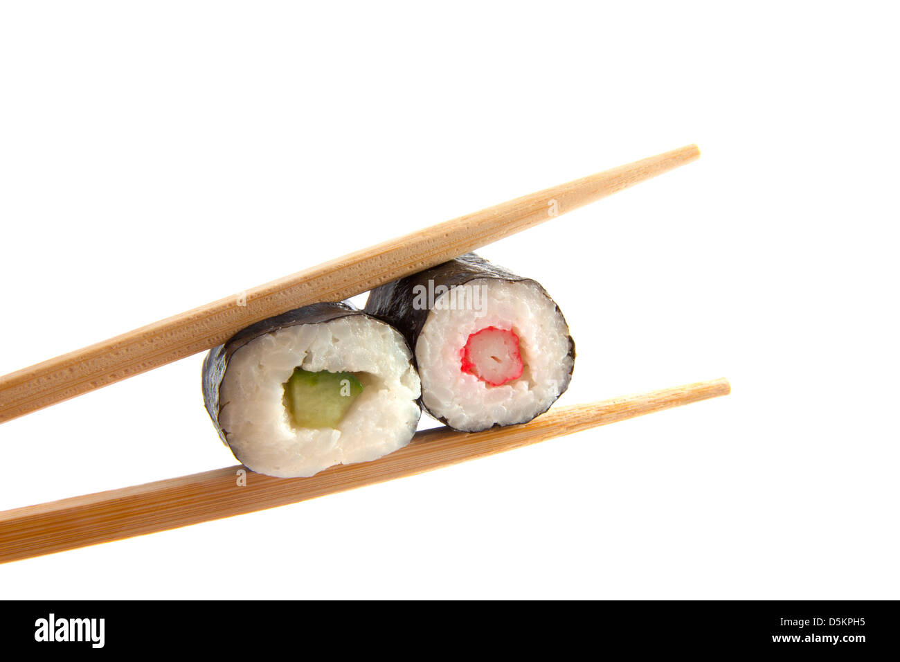 Sushi between two sticks isolated over white Stock Photo - Alamy