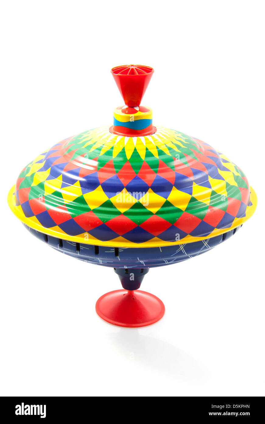Colorful spinning top isolated on a white background Stock Photo - Alamy