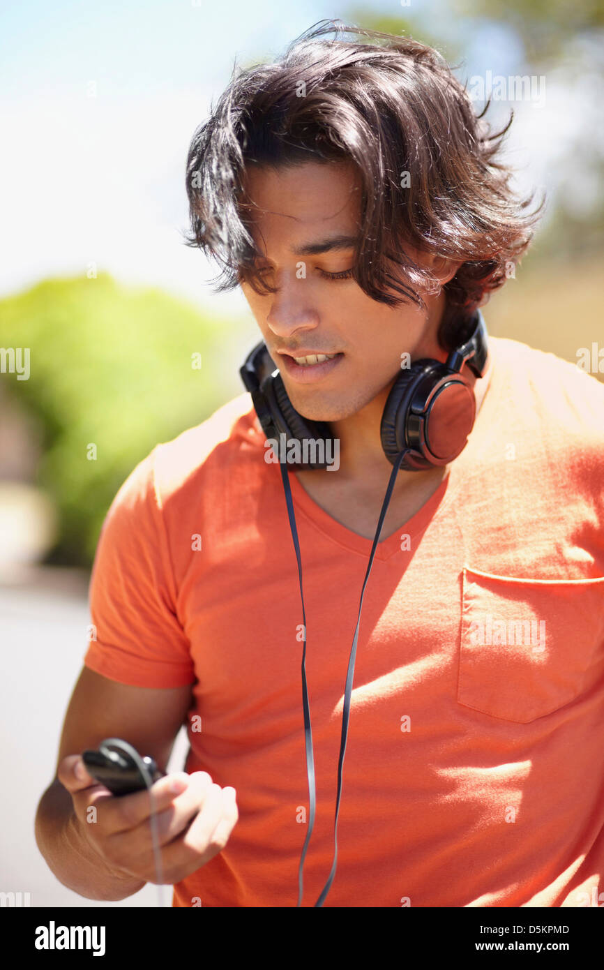 Black headphones on neck hi-res stock photography and images - Alamy