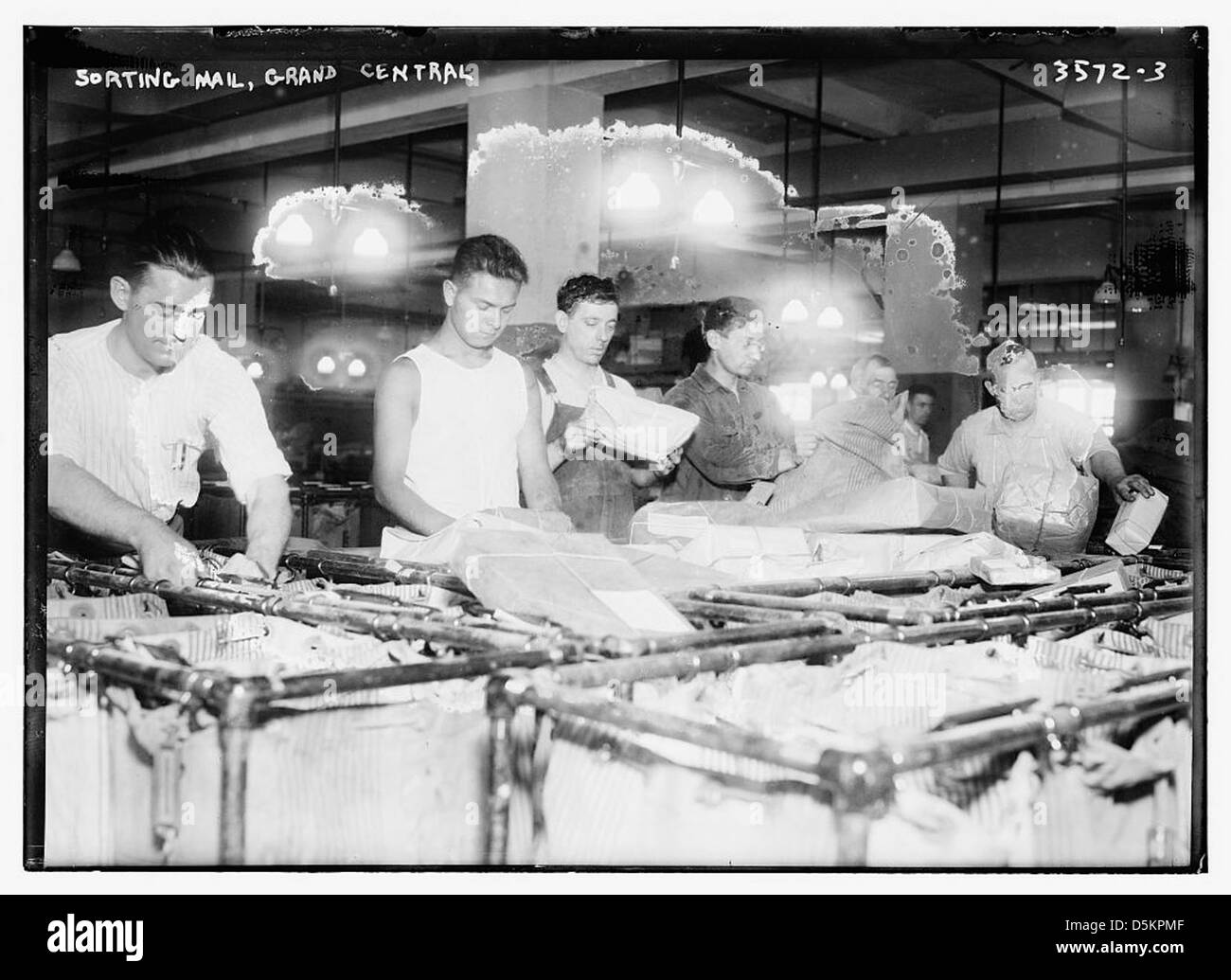 A photograph from the Library of Congress depicting postal workers ...
