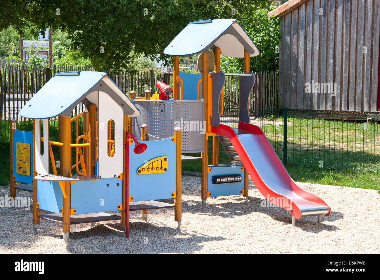 Colorful playground toys in a park for young children Stock Photo - Alamy