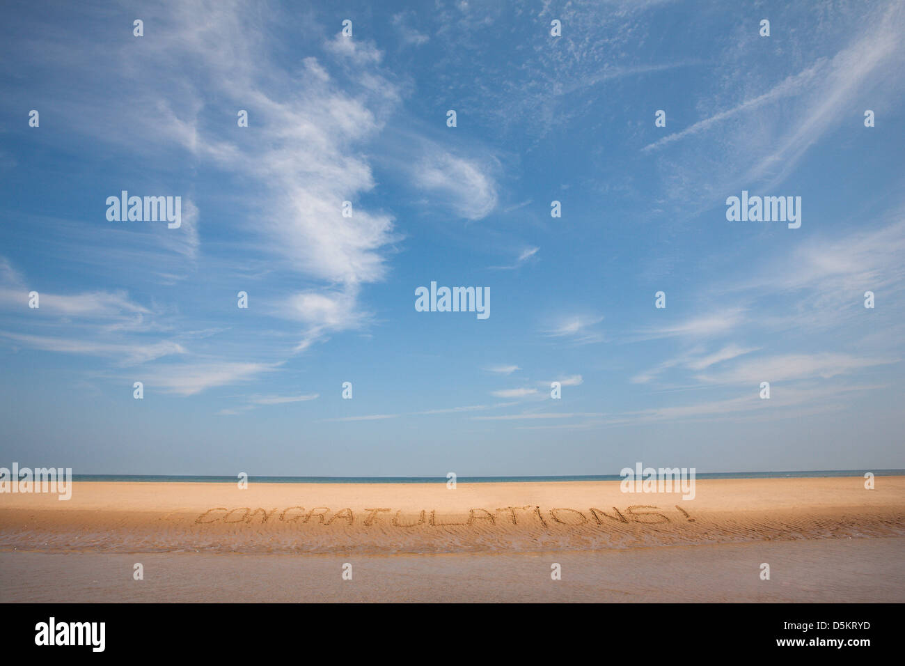 CONGRATULATIONS; MESSAGE; WRITTEN; SAND; BACKGROUND; SKY; SAND; BEACH ...