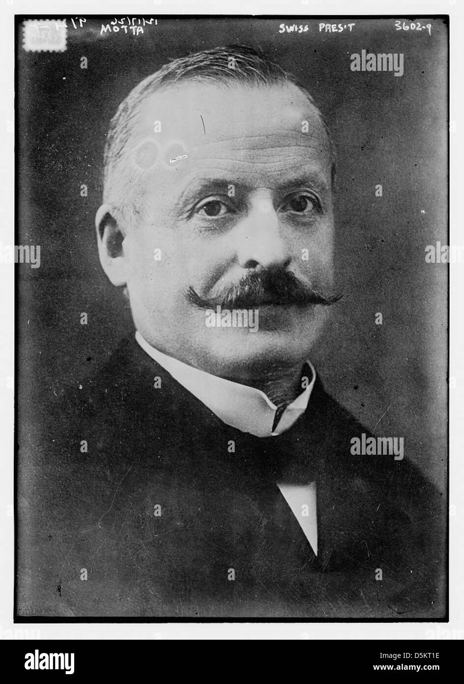 This photograph shows the Swiss President Motta, captured in a formal ...