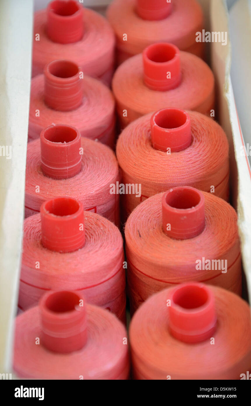 red cotton spools Stock Photo - Alamy