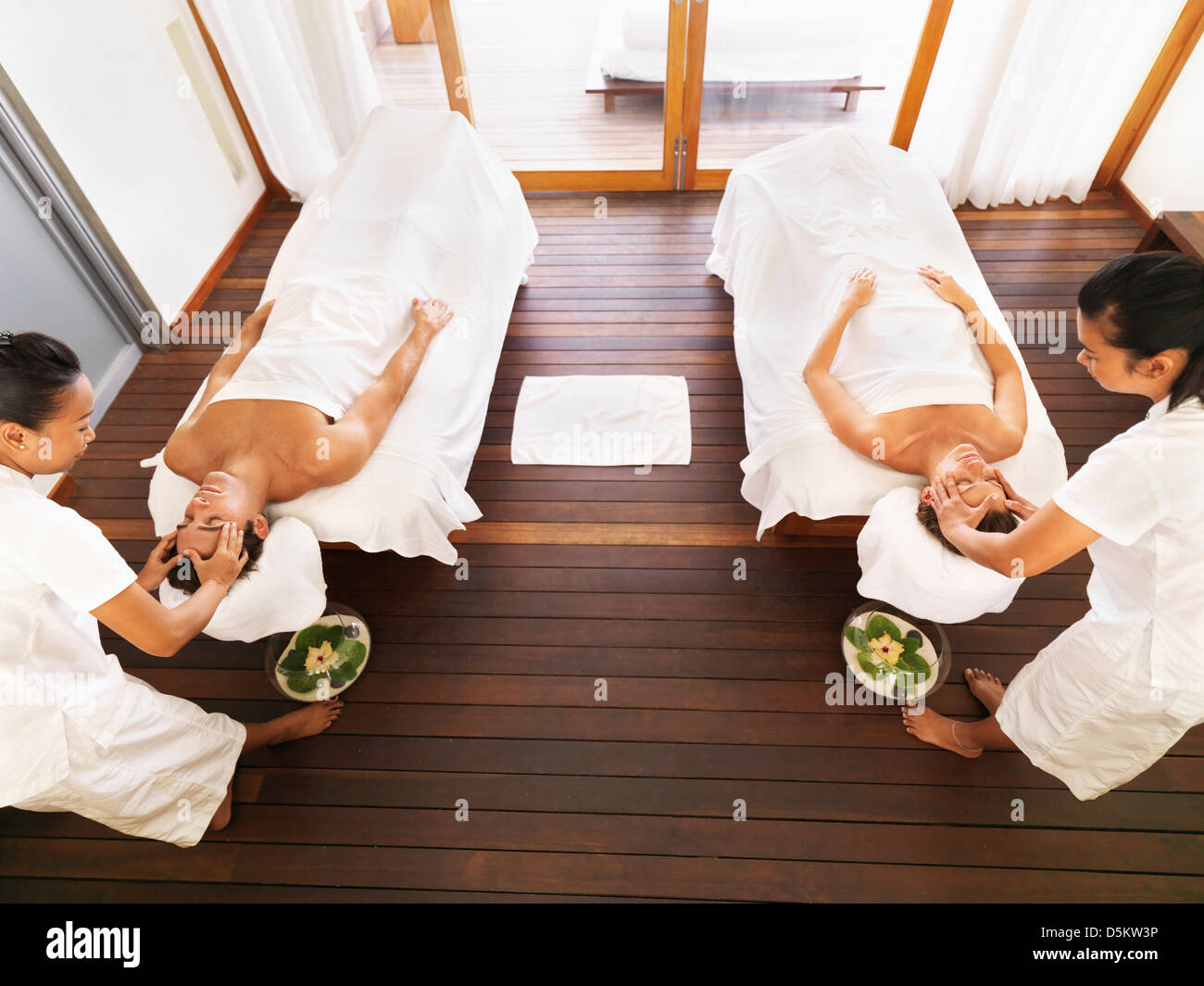 Four Massaging Hi res Stock Photography And Images Alamy
