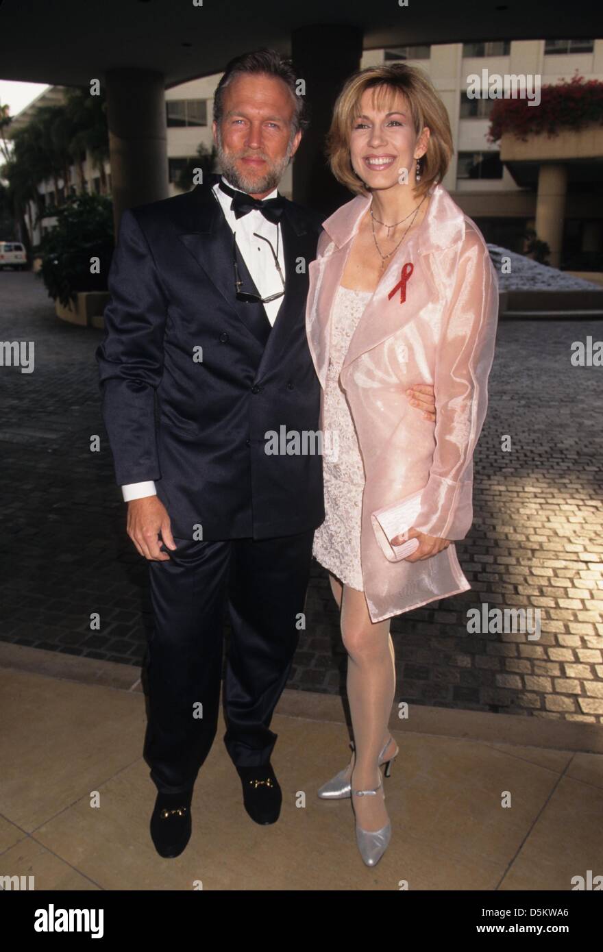 LEEZA GIBBONS with Stephen Meadows at T.V. Cares 1996.(Credit Image ...