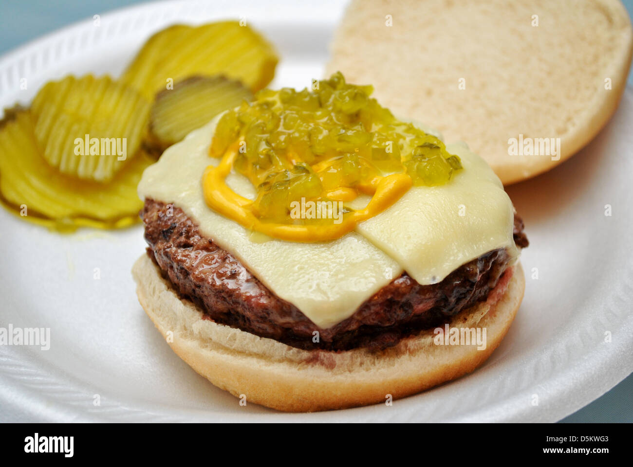 Cheese Burger with Condiments Stock Photo - Alamy