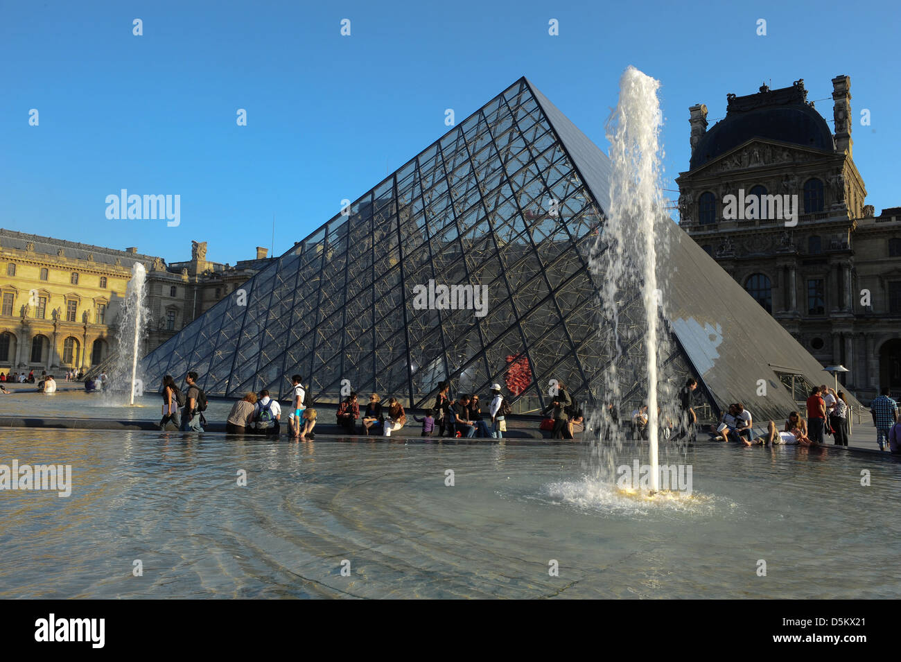 General View of Musee du Louvre and fountain in front of the building ...
