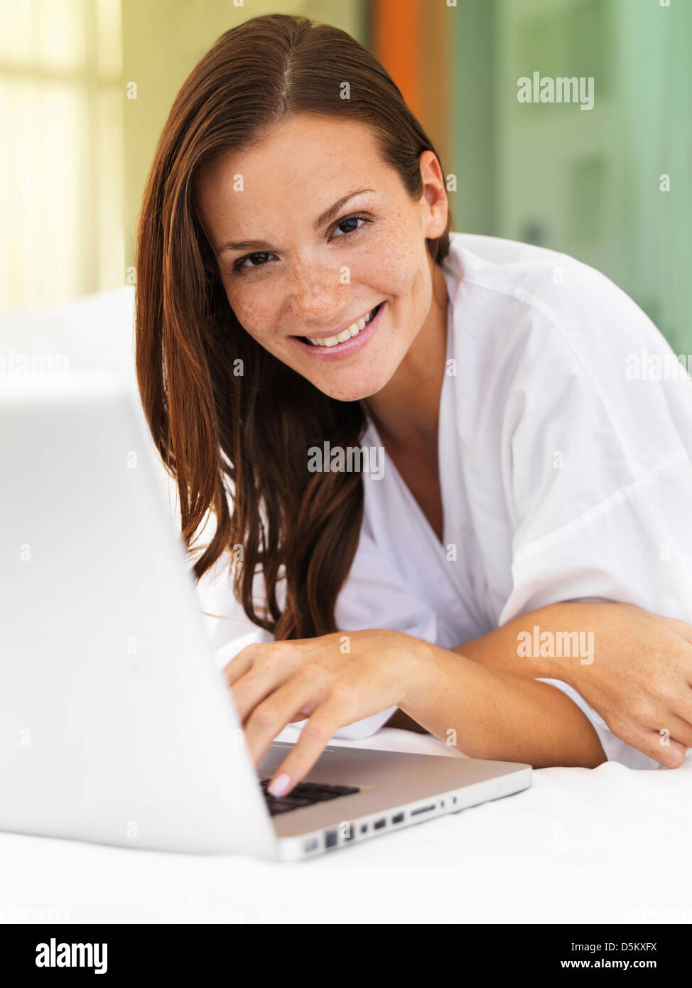 Woman using laptop Stock Photo - Alamy