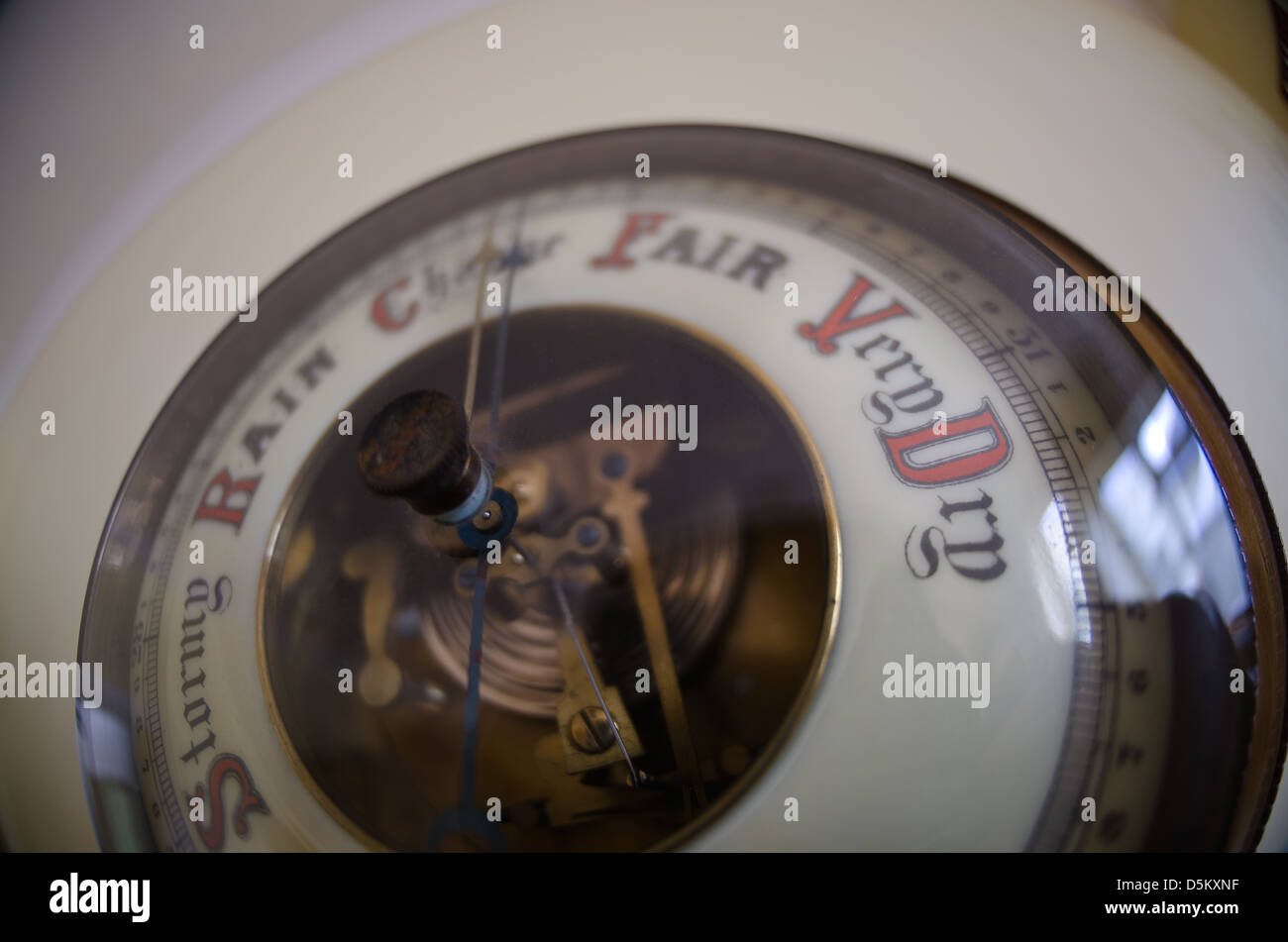 Old classic collectible aneroid barometer used for measuring and ...