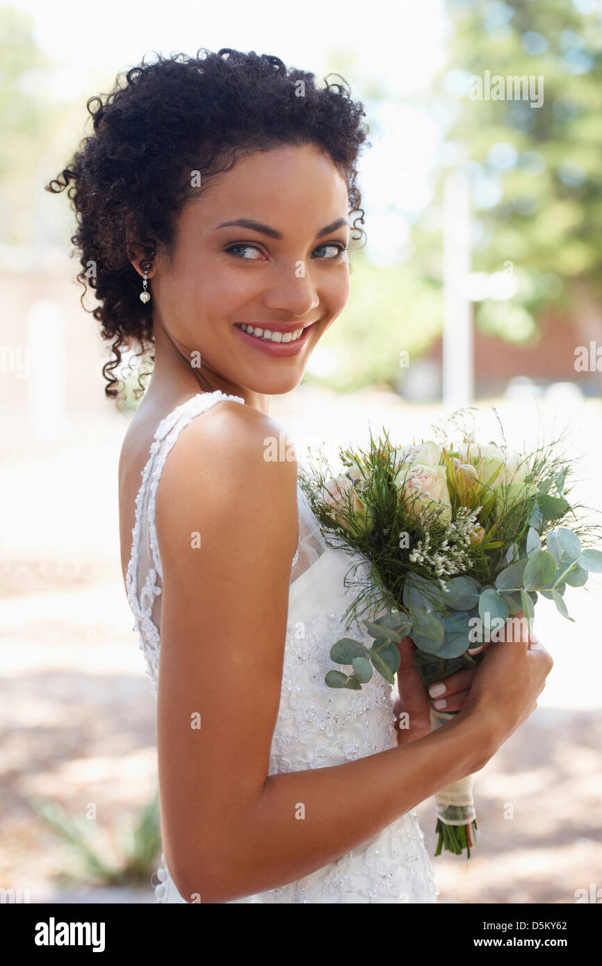 Portrait of bride with bouquet Stock Photo - Alamy