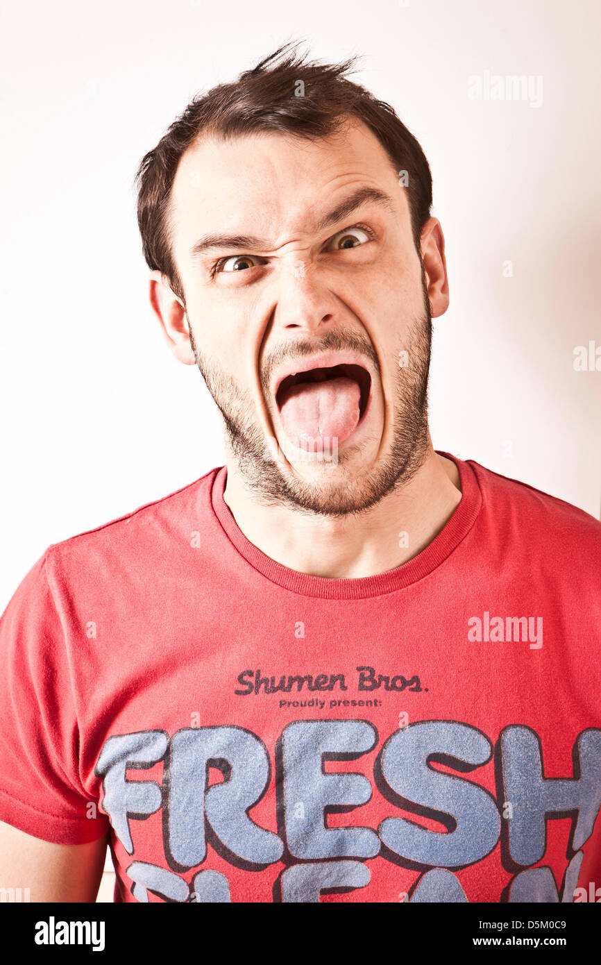 Vertical portrait spiteful man hi-res stock photography and images - Alamy
