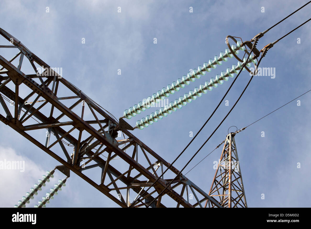 Steel lattice high voltage transmission tower - detail with cables and ...