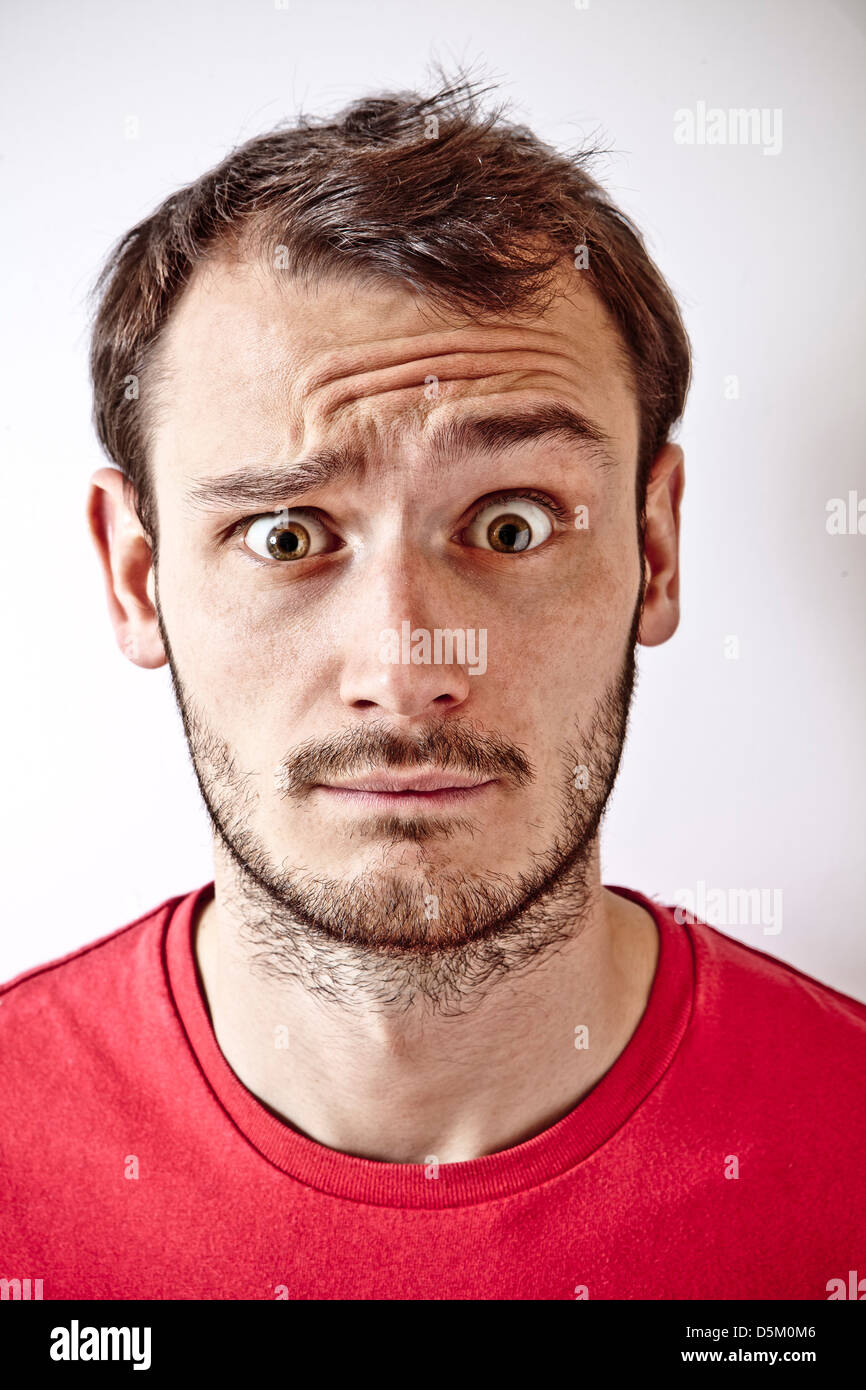 man with eyes wide open Stock Photo - Alamy