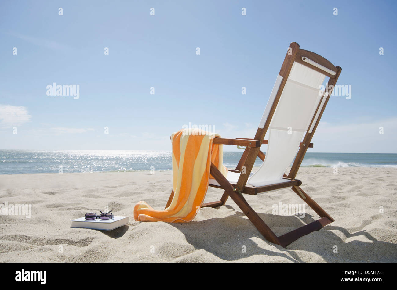 Sun chair on sandy beach Stock Photo - Alamy