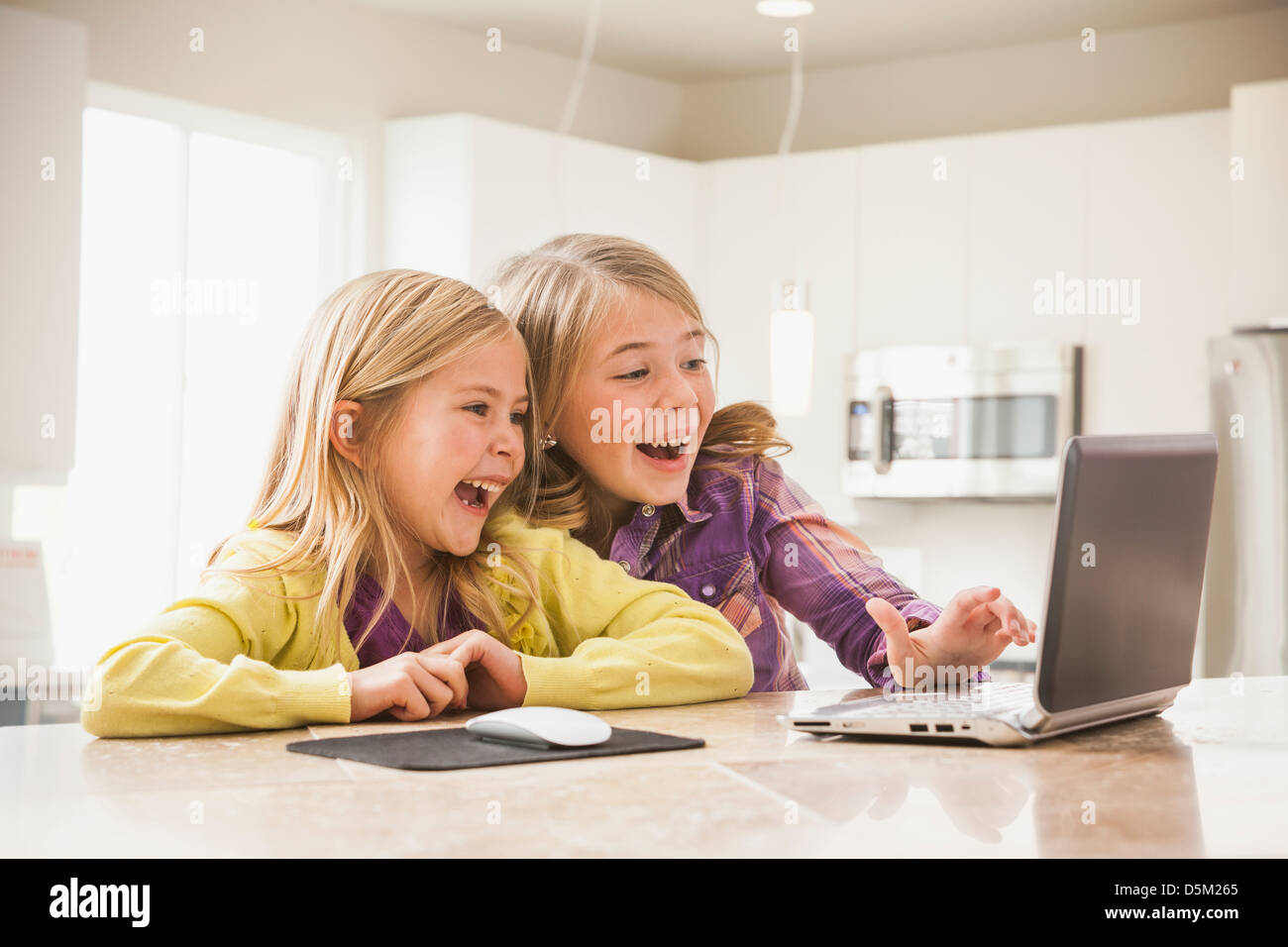 Blonde hair girl laptop hi-res stock photography and images - Alamy