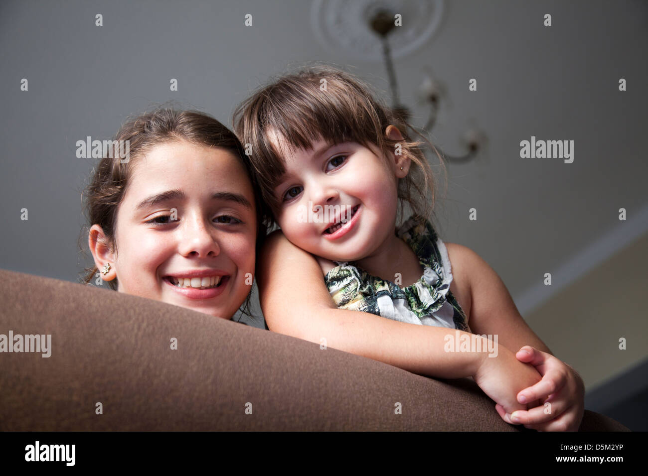 Smiling cousins hi-res stock photography and images - Alamy