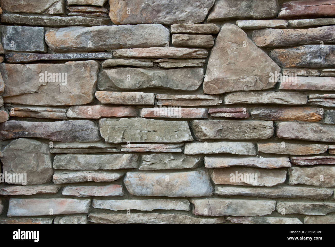 Close-up of stone wall Stock Photo - Alamy