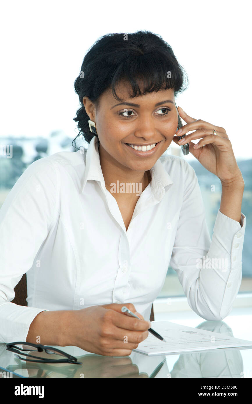 Young black business woman at work Stock Photo - Alamy