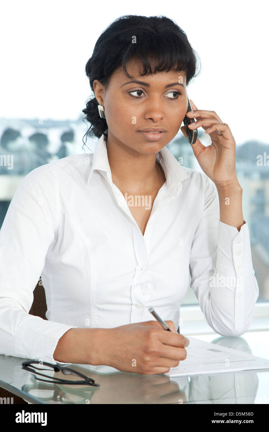 Young black business woman at work Stock Photo - Alamy