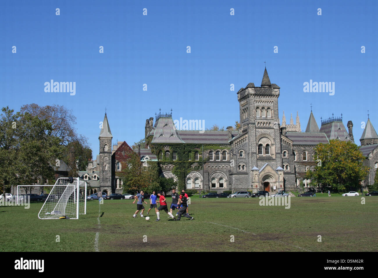 University of Toronto front campus students playing soccer in front of ...