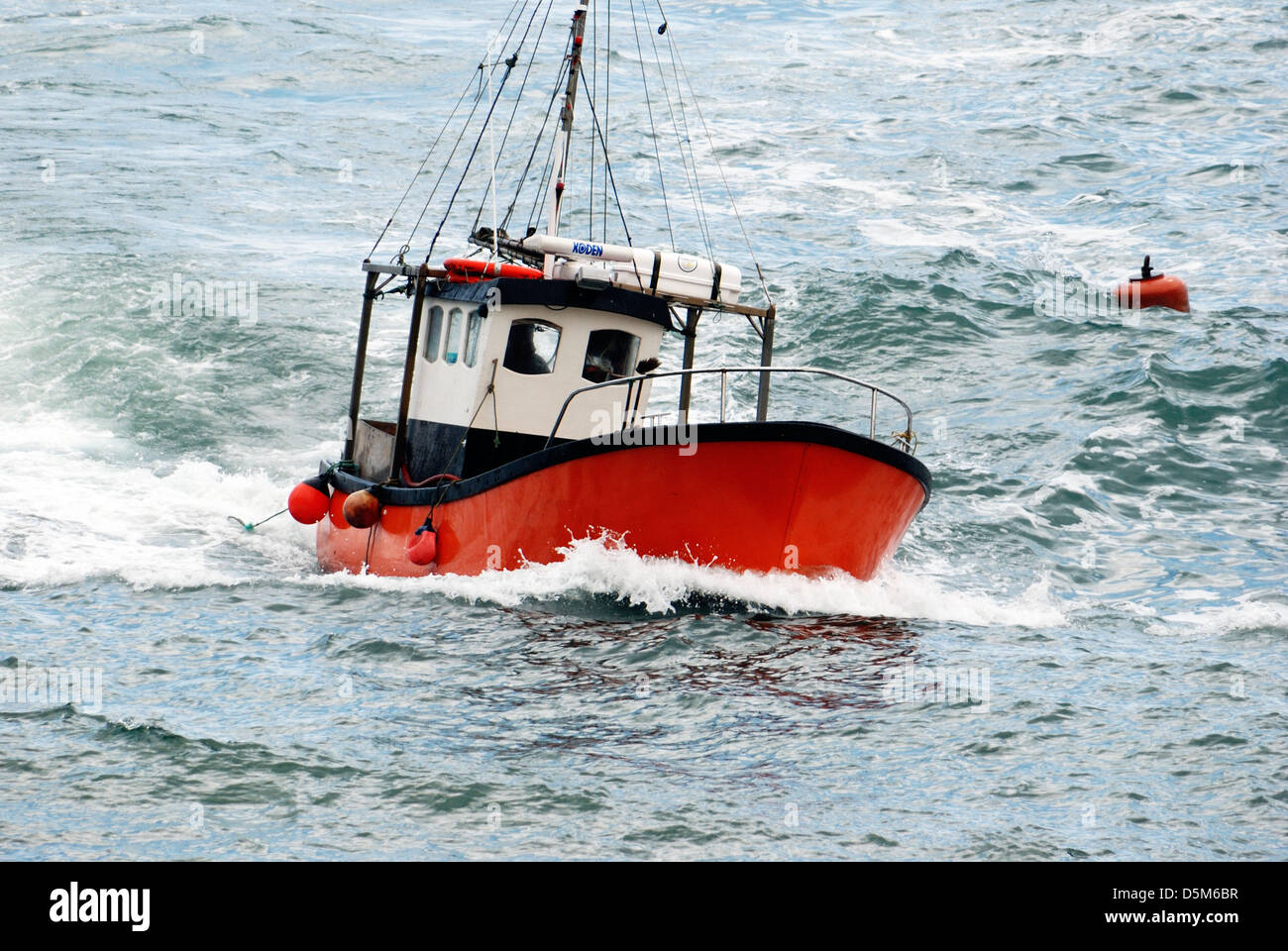 Fishing boat at sea Stock Photo - Alamy