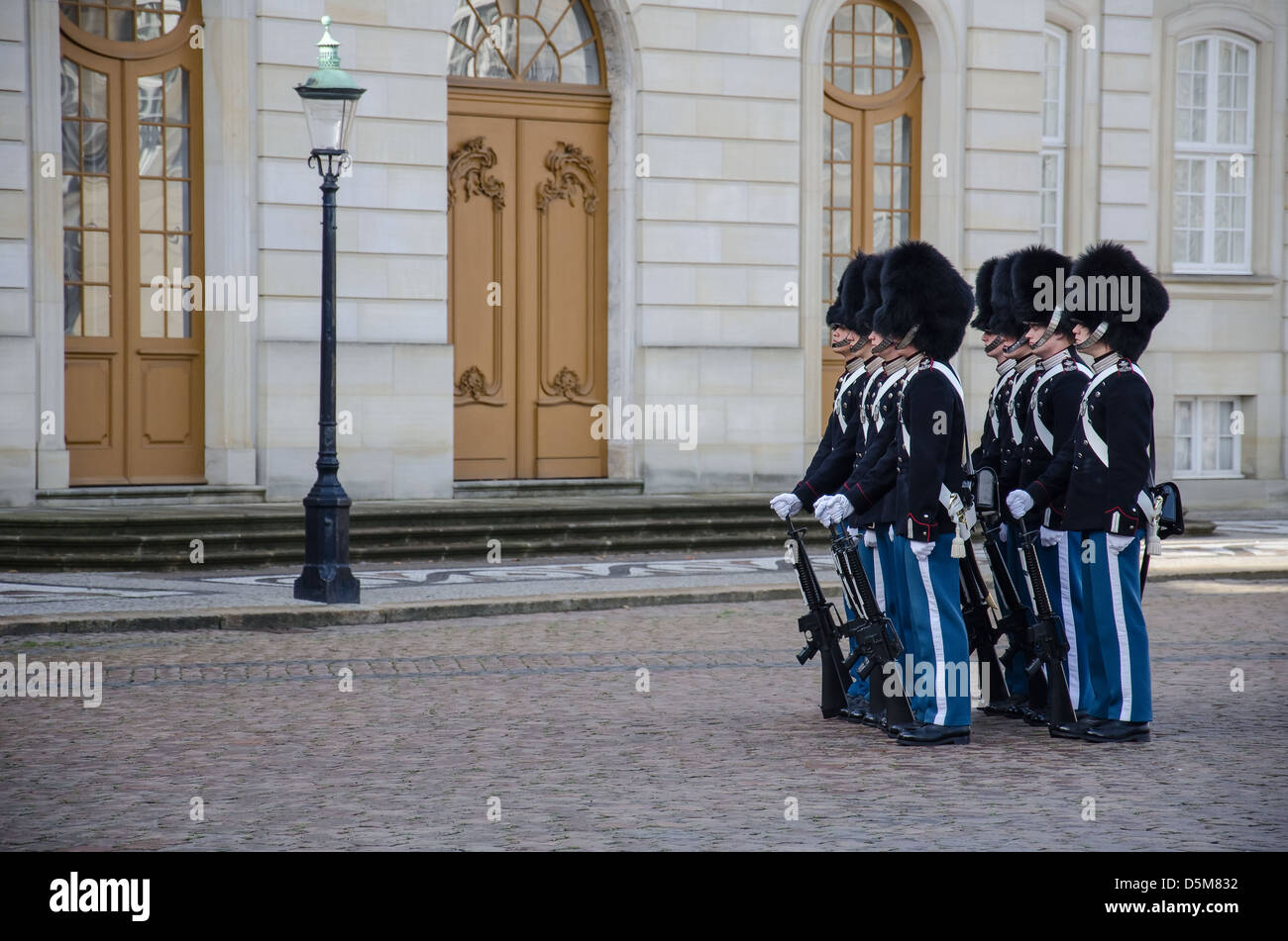King and Queen high guard at Amalienborg Castle in Copenhagen Denmark ...