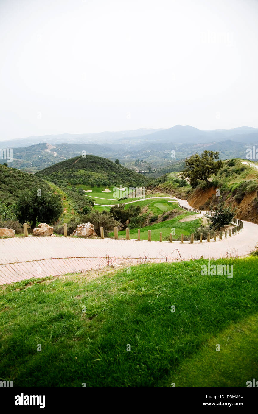 Beautiful golf course in the middle of mountains Stock Photo - Alamy