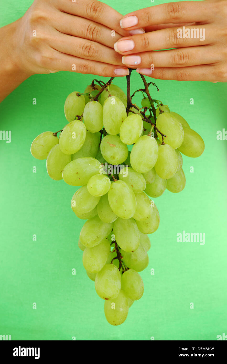 grape in woman hands close up Stock Photo - Alamy